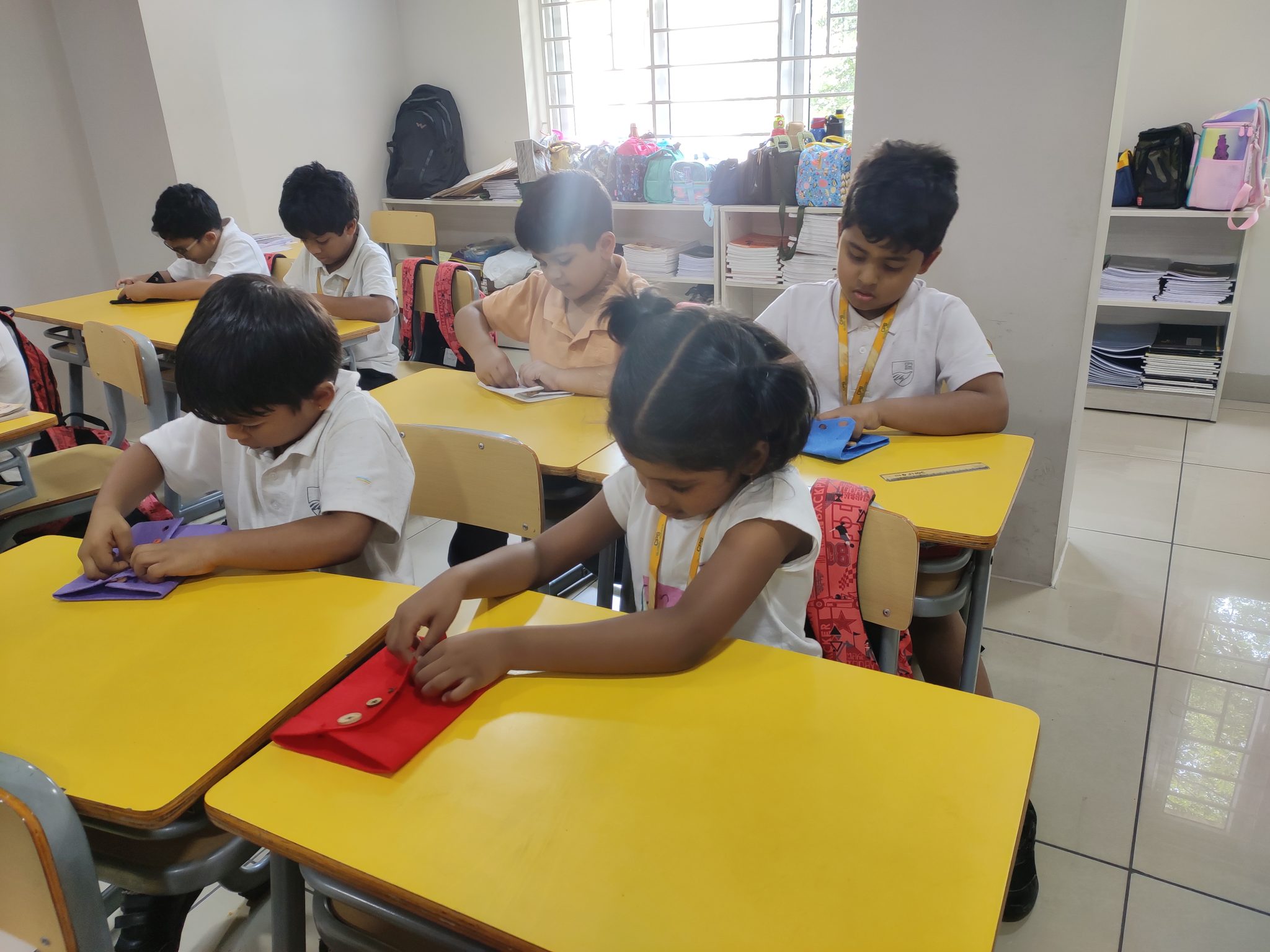 Learning Buttoning and Unbuttoning @ CPS Global School, Anna Nagar - CPS Global